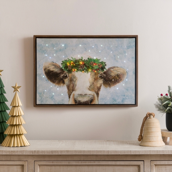 Kirklands LED Cow with Christmas Greenery Canvas Art Print | Hamilton Place