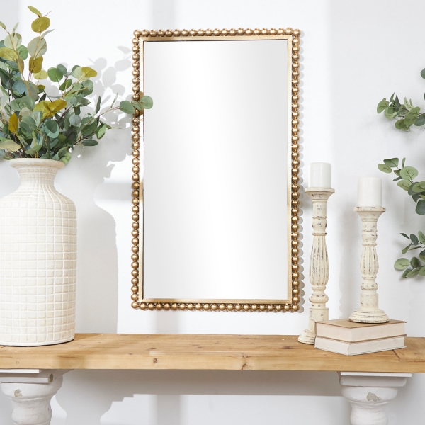 Kirklands Gold Metal Beaded Frame Wall Mirror at Hamilton Place in ...